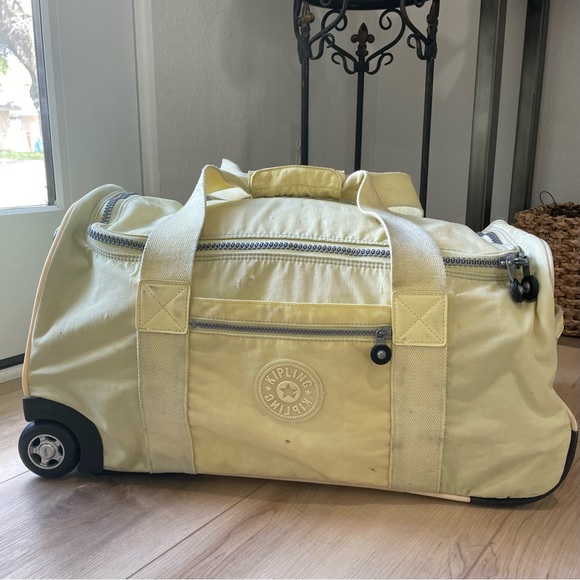 Kipling | Bags | Kipling Canyon Madison 22 Wheeled Rolling Carryon Luggage Yellow | Poshmark